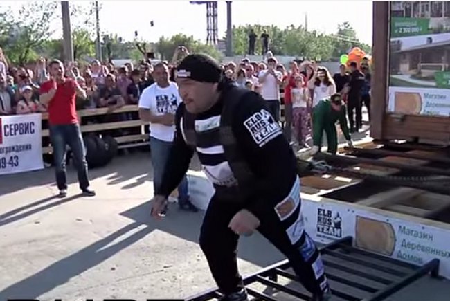 Russian Strongman Moves A Two-Story House To Set A New World Record