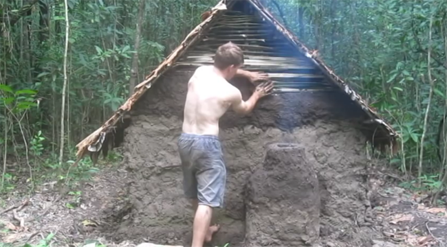 VIDEO: Real Life 'Survivorman' Builds A Hut With His Bare Hands