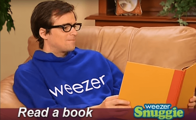 Band Merch: KISS Kaskets, Weezer Snuggies, And 6 More Weird Items