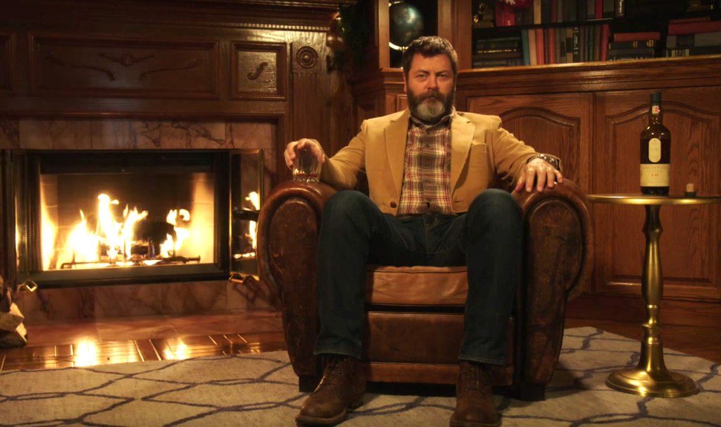 Nick Offerman Drinks Whisky By Fireplace For 45 Minutes