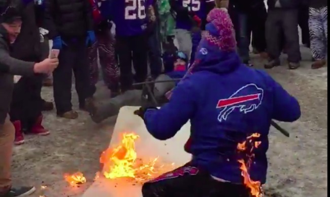 Watch A Buffalo Bills Tailgater Jump Onto A Flaming Table