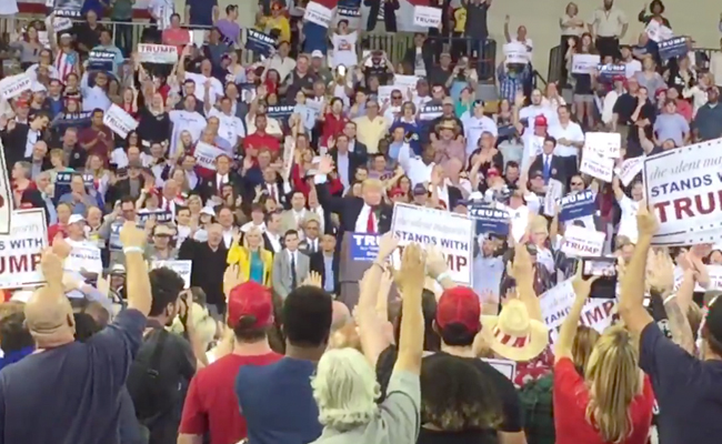 Donald Trump Tells Rally To Raise Right Hands And Pledge Their Votes