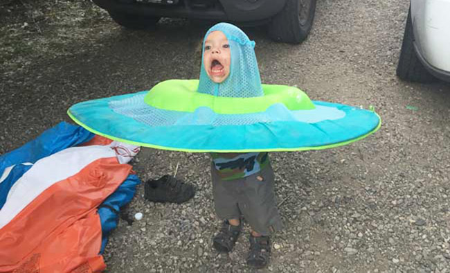 Kid Stuck In A Swimming Pool Floatie Is The Internet's Latest Meme