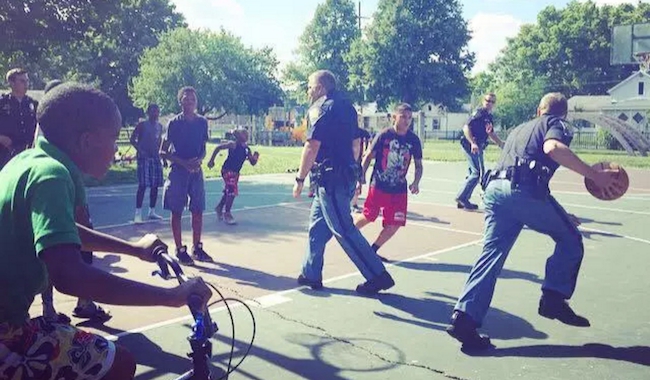 Watch A Bunch Of Police Officers Play Basketball With Local Kids