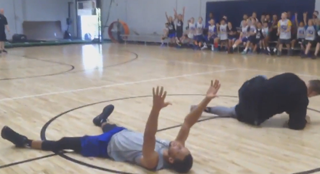 Steph Curry Drained A Seated Half-Court Shot At A Bay Area Youth Camp