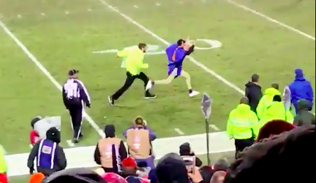 This Security Guard Executed A Perfect Diving Tackle On A Streaker