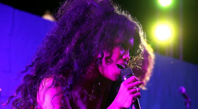 [WATCH]: SZA Covers Cardi B's 'Bodak Yellow' With Drake Watching