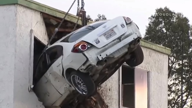 Dramatic New Footage Shows Car Crashing Into A Building's Second Story