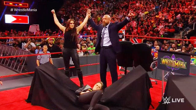 Watch Ronda Rousey Get Put Through A Table On WWE Raw