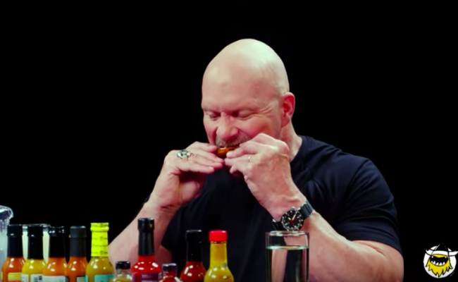 Watch Steve Austin Answer Questions While Reacting To Spicy Hot Wings