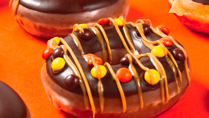 We Tasted And Ranked All Three Of Krispy Kreme's Reese's Donuts