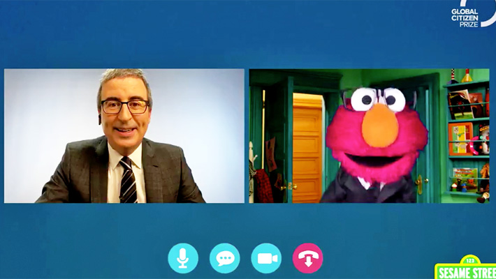 John Oliver& His Twin, Elmo, Teamed Up For An Important Global Message