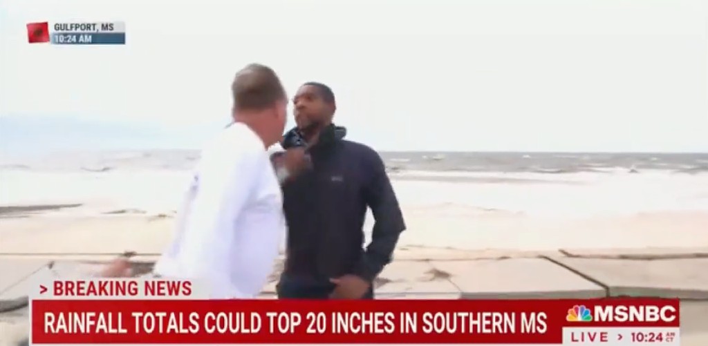 Reporter Bizarrely Confronted By A Man Mad About Hurricane Coverage