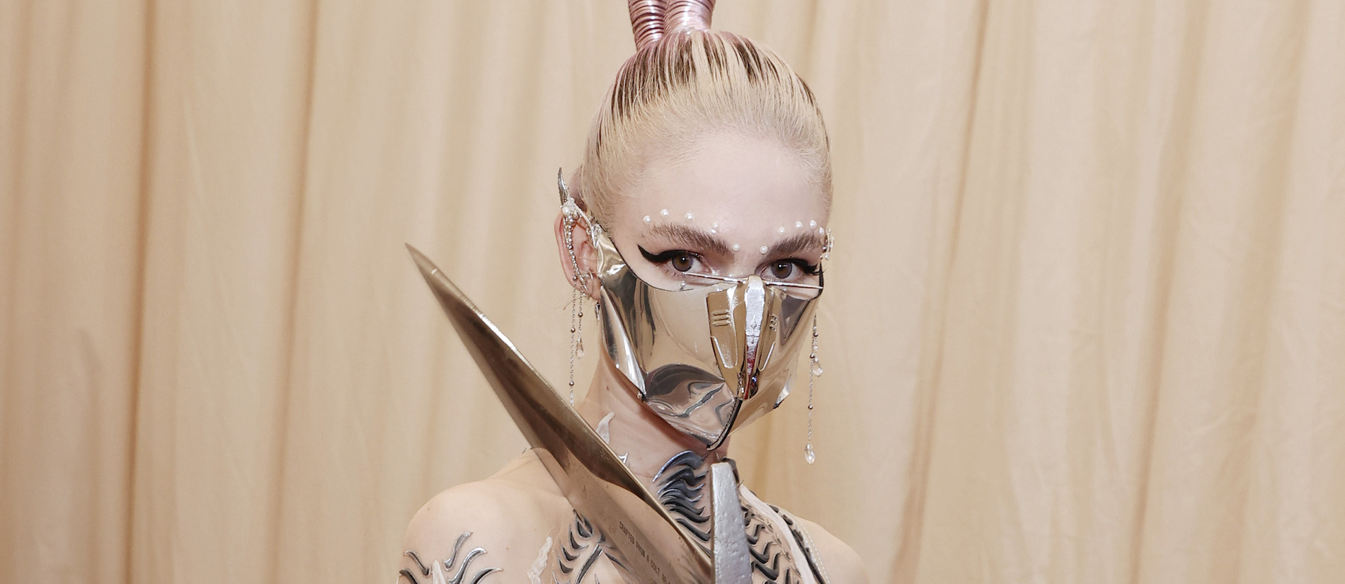 Grimes Is Considering Getting Elf Ears And Vampire Teeth